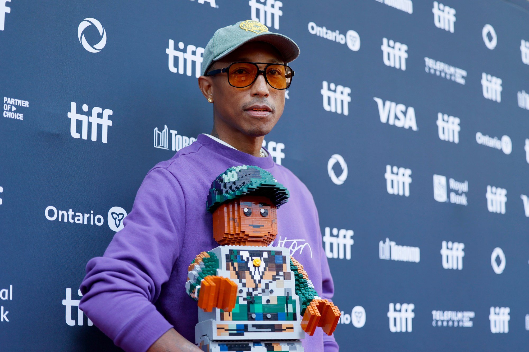 Pharrell Williams London Movie Premeire Disrupted By PETA - WBLS